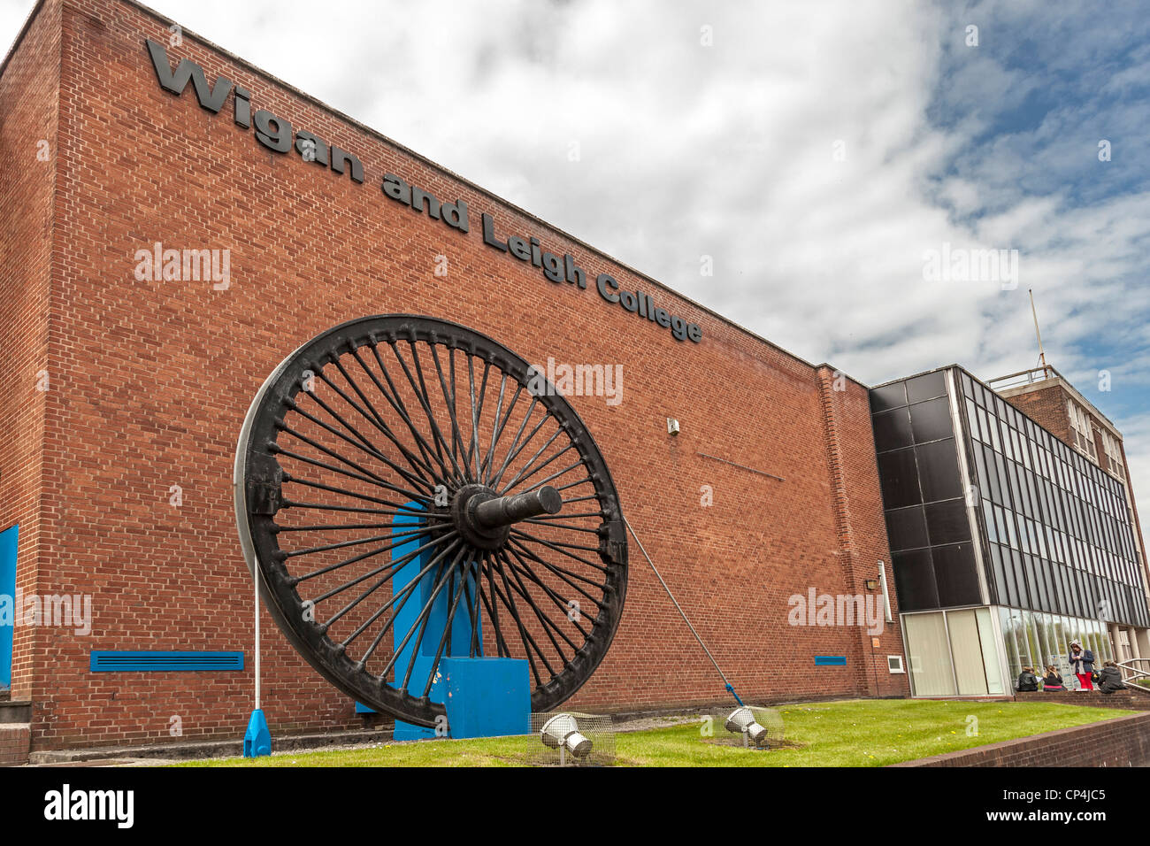 The pit winding wheel at the Wigan and Leigh College in Wigan Stock ...
