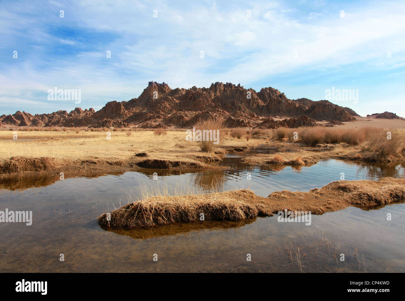 Red rocks in the barren sands of the Gobi Desert Stock Photo - Alamy