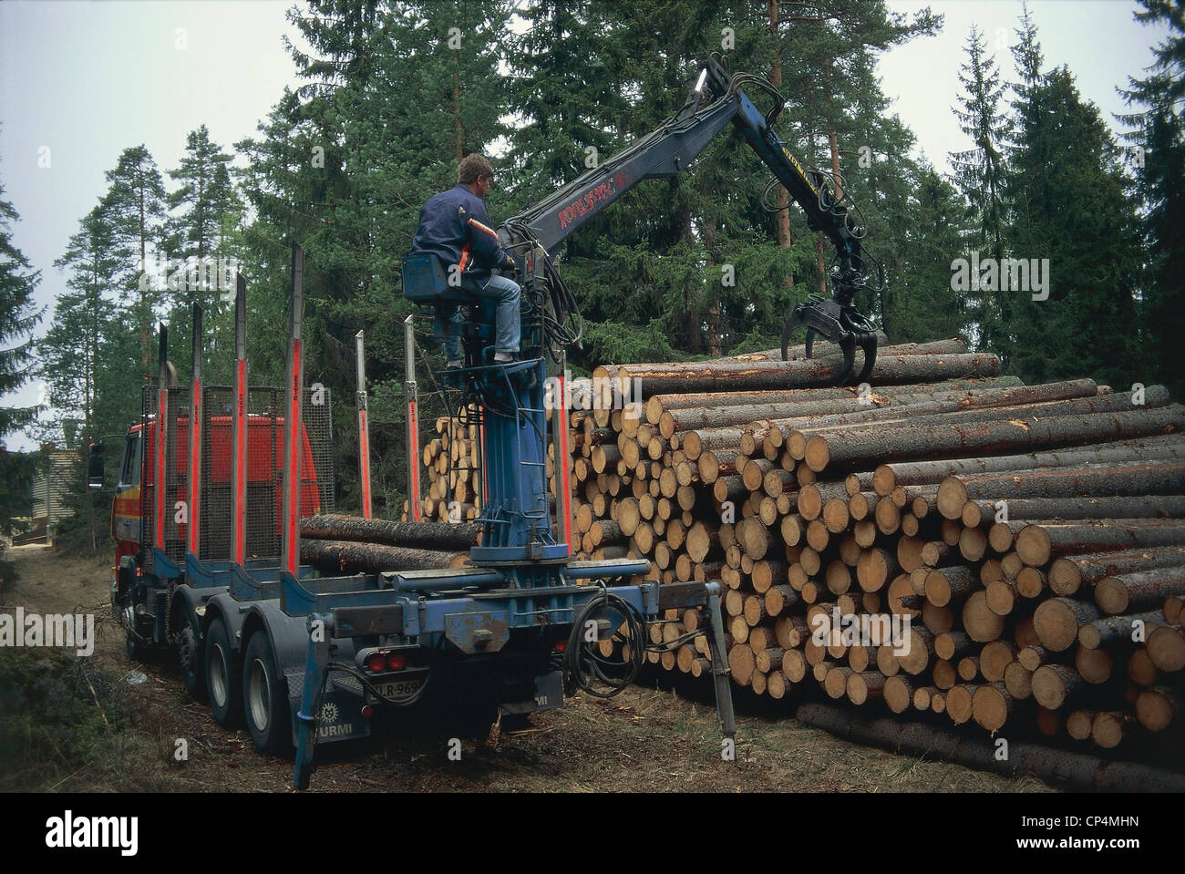 Finland - Transport of timber: loading and unloading of logs Stock ...