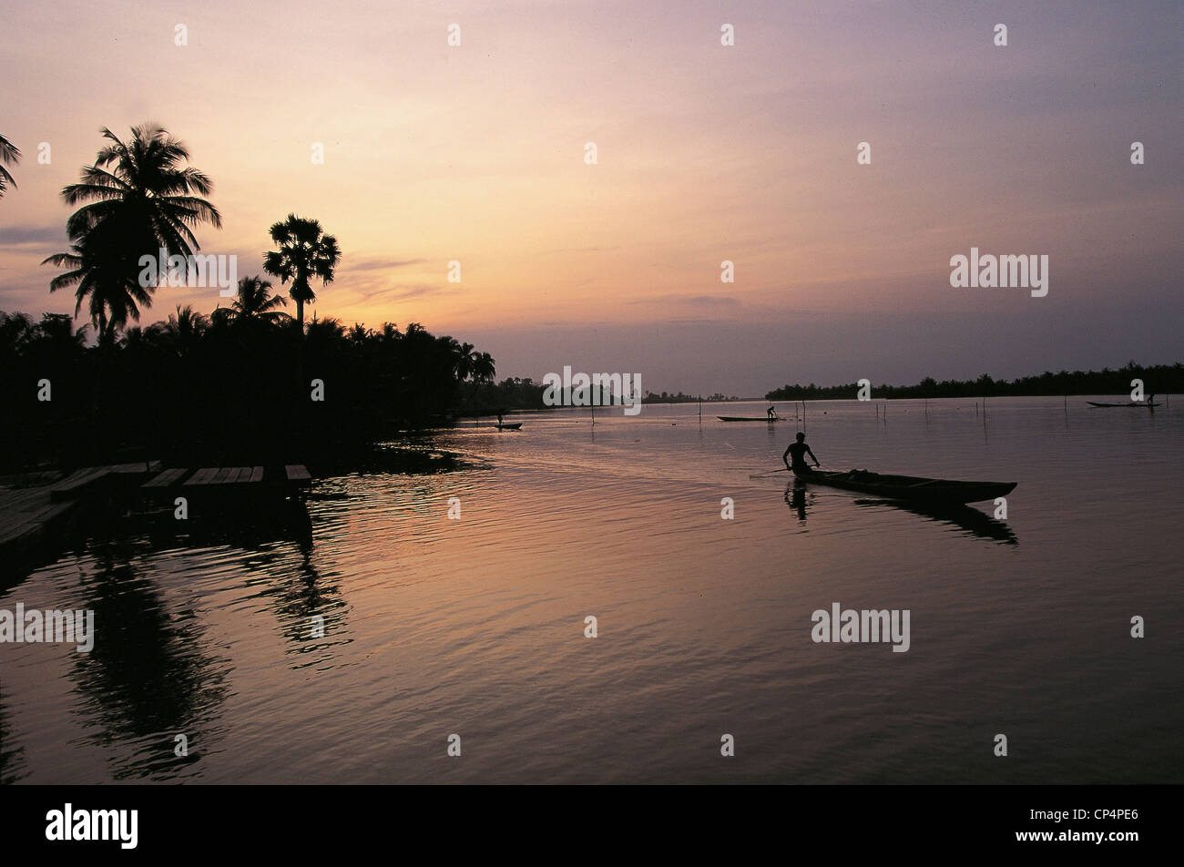 Ivory Coast - The lagoon Ebri 'at sunset Stock Photo - Alamy