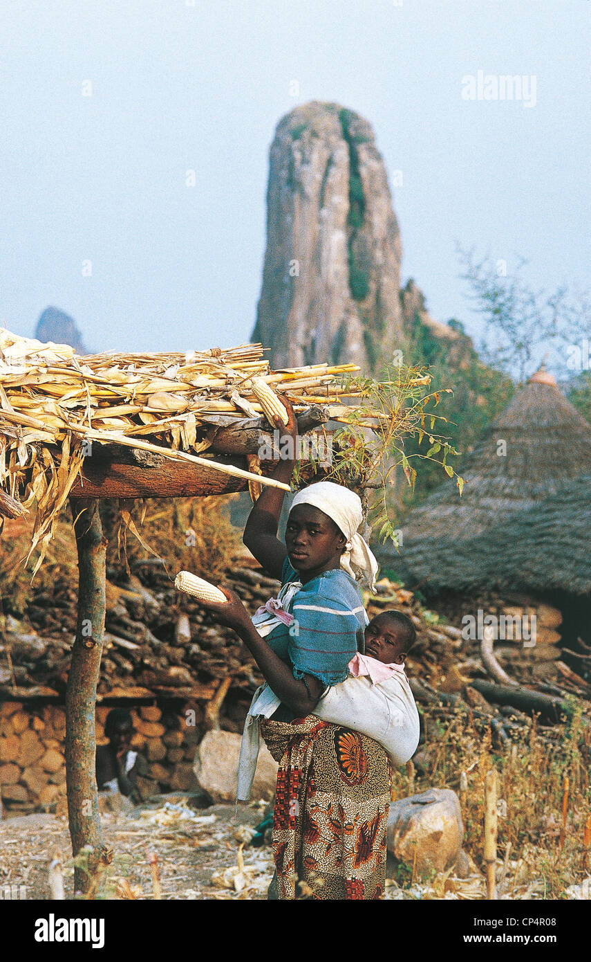 Cameroon - Northern Region - Kapsiki - Rumsiki. Woman with baby corn ...