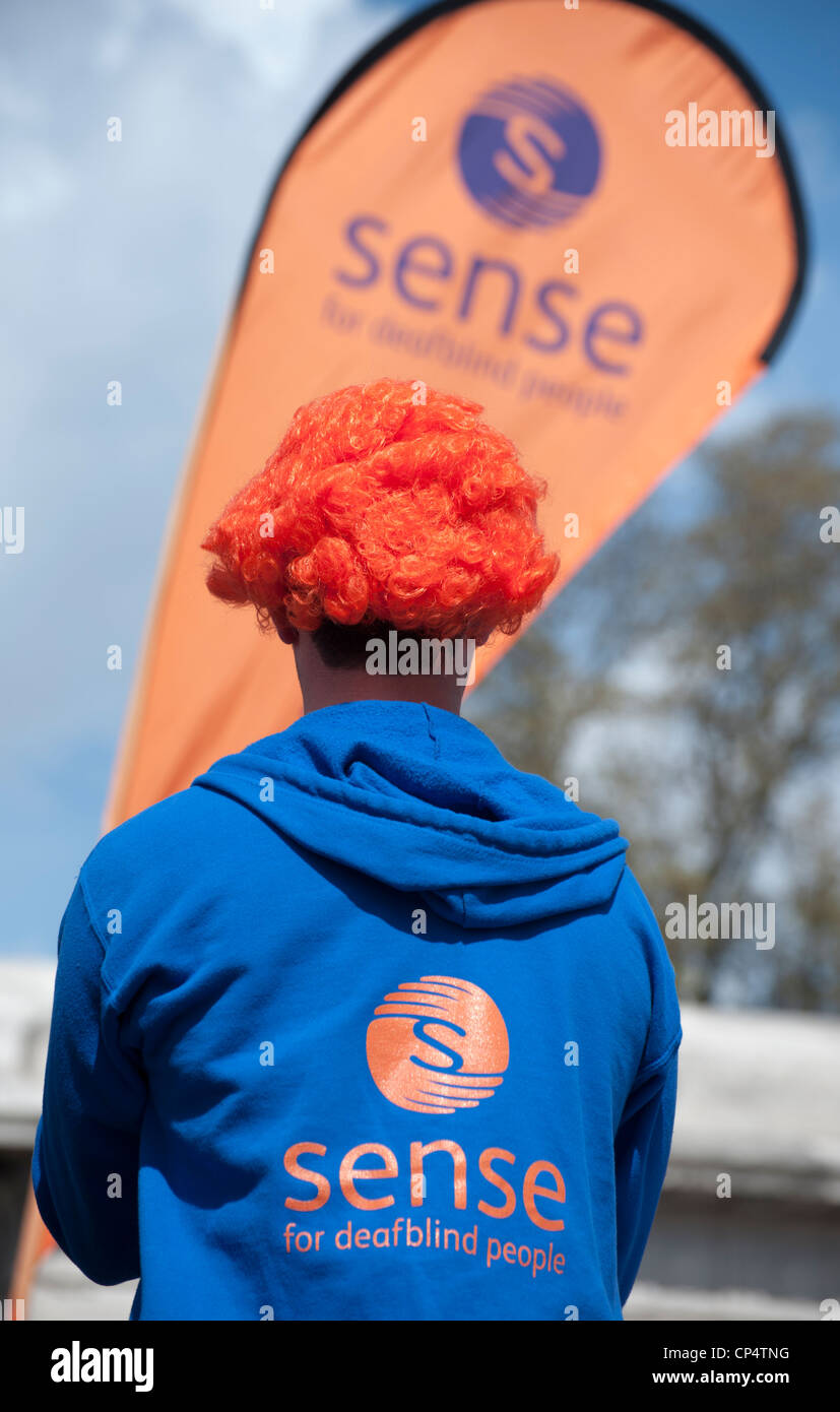 Sense charity for deaf blind people man in fancy dress with charity ...