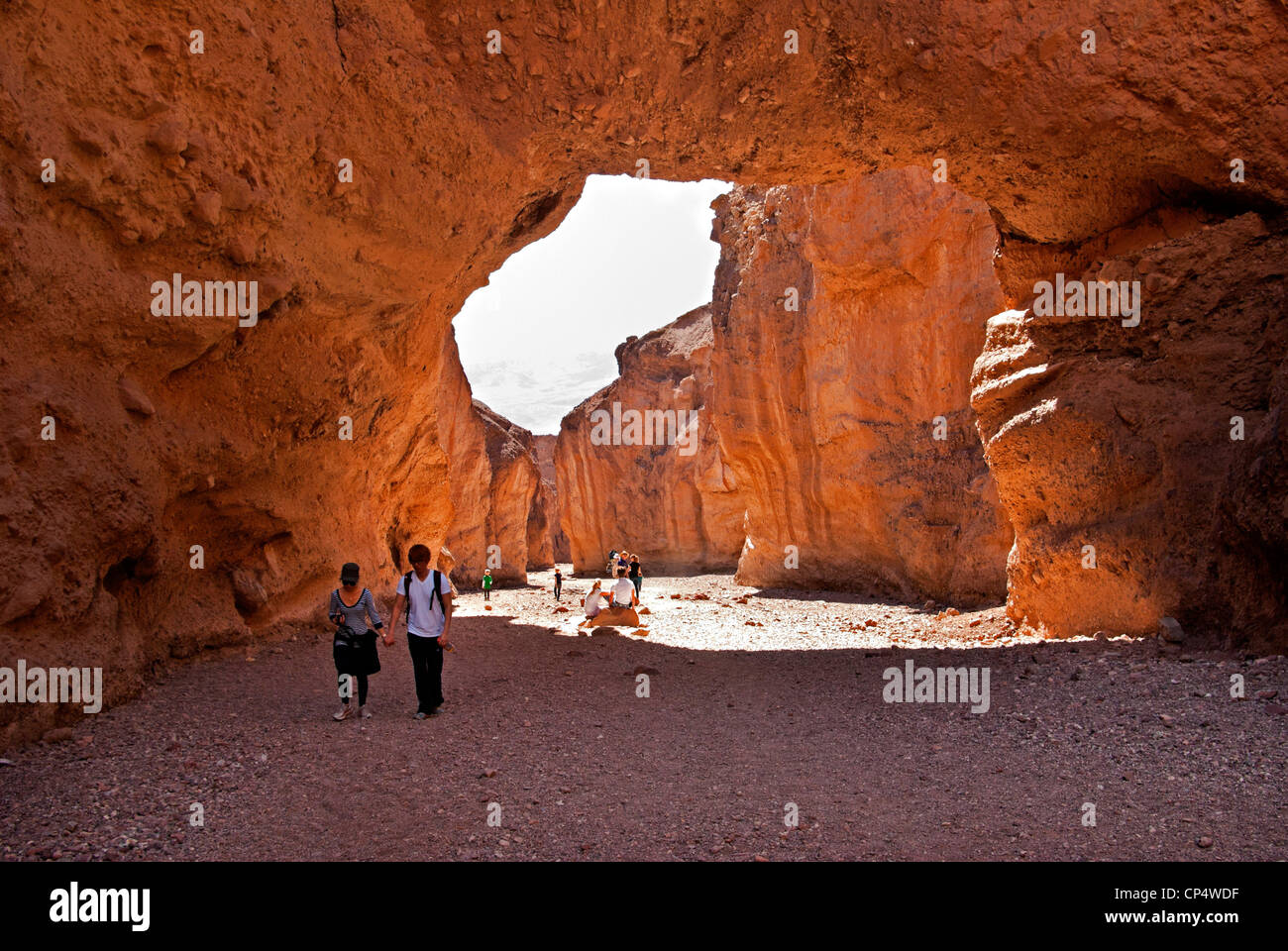 Natural Bridge, hikers exploring rock formation Stock Photo - Alamy