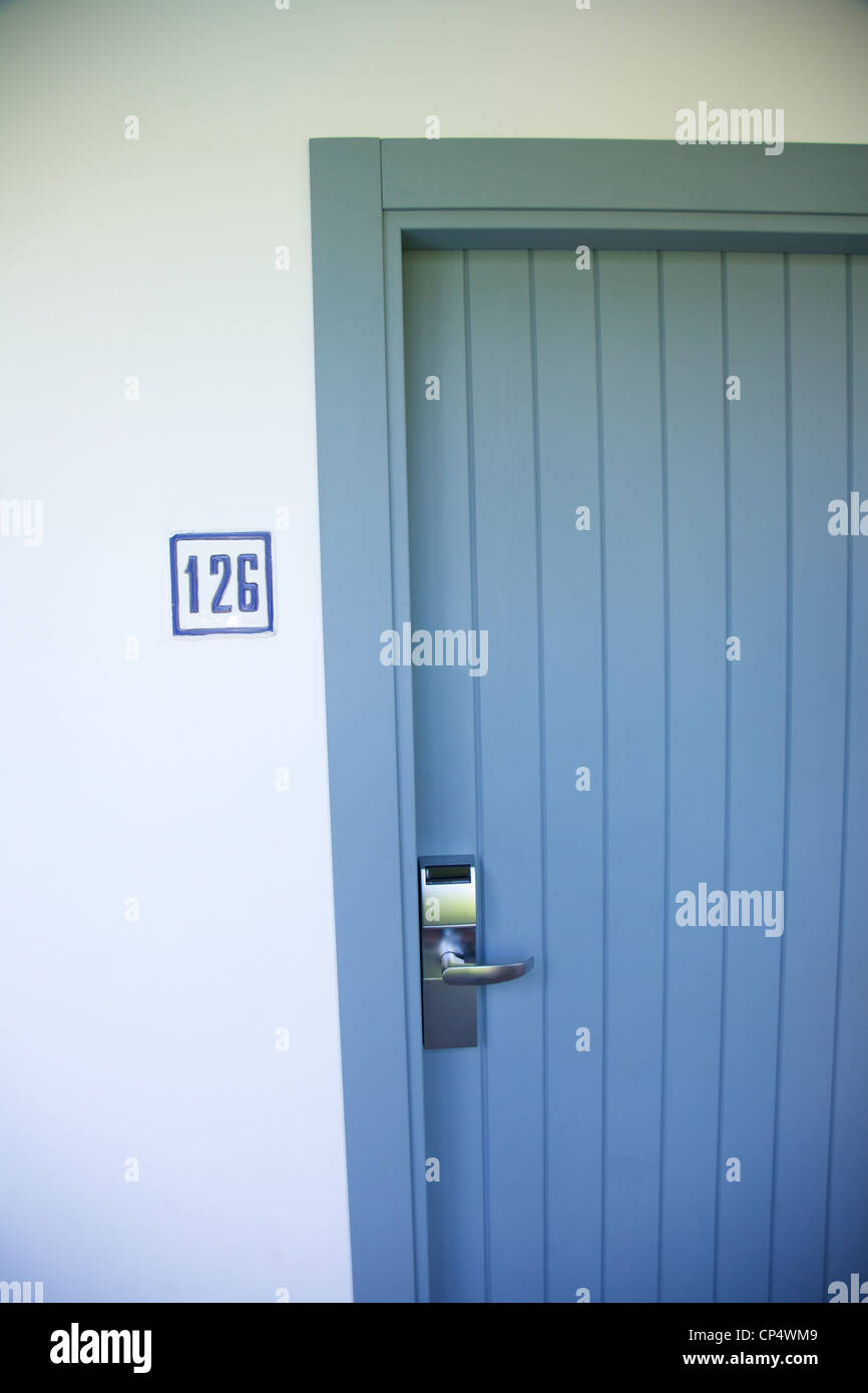 metal lock-card and handle on blue wood door Stock Photo - Alamy