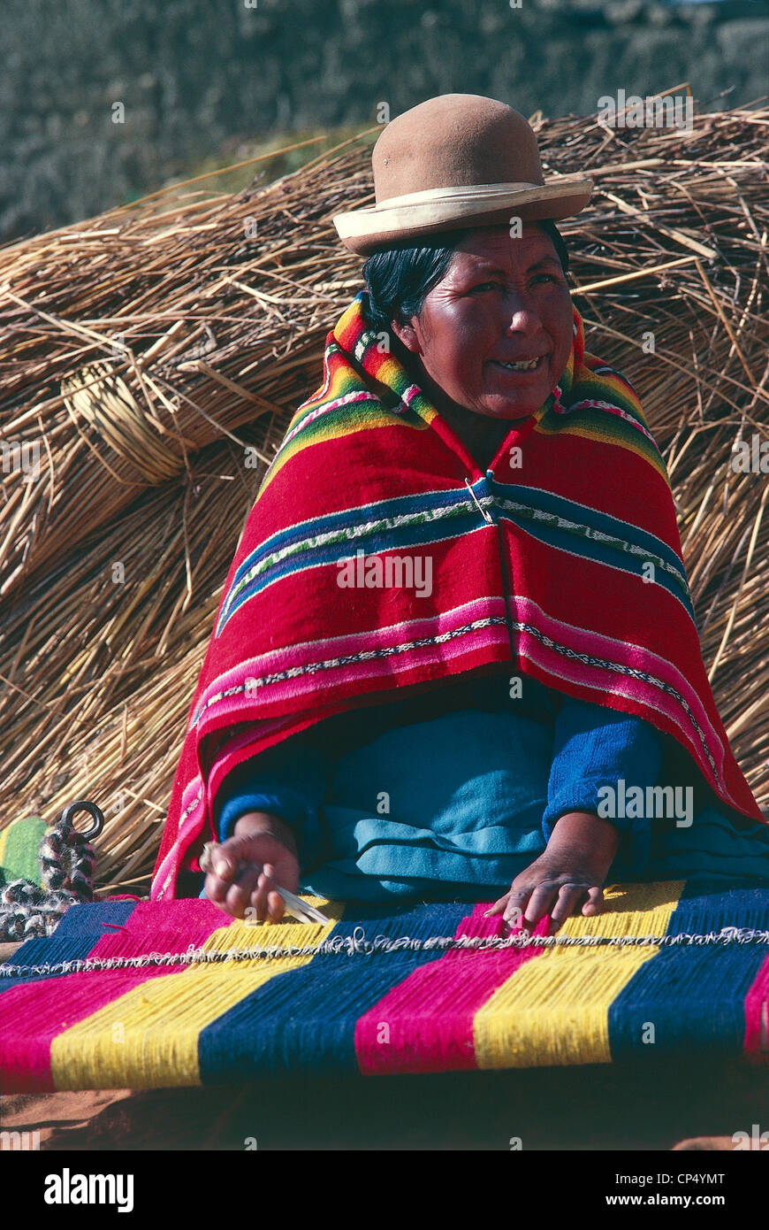 Bolivia - Lake Titicaca - Island Suriqui. Weaving craft: to frame woman ...