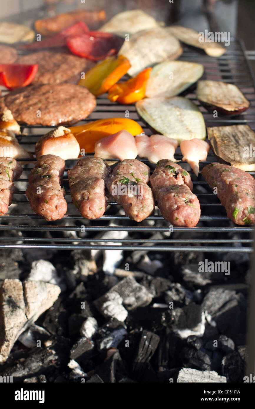 Close of up food on an outdoor barbeque Stock Photo - Alamy