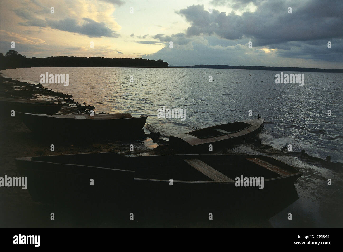 Poland - Masuri Lakes National Park - Boats on the shore of Lake Dargin ...
