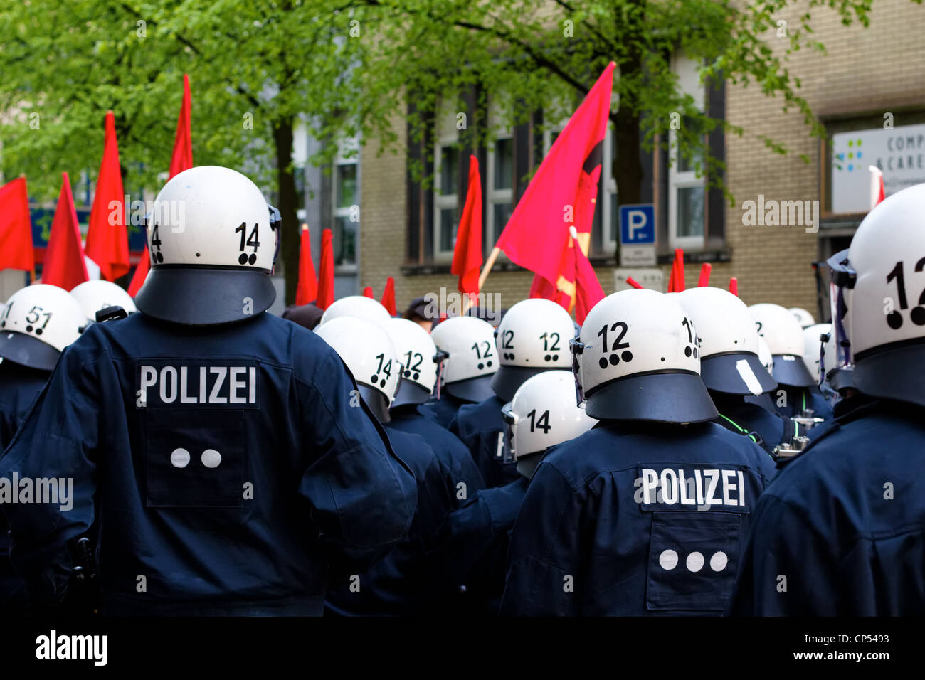 German police officers in full riot gear face protesters during the May ...
