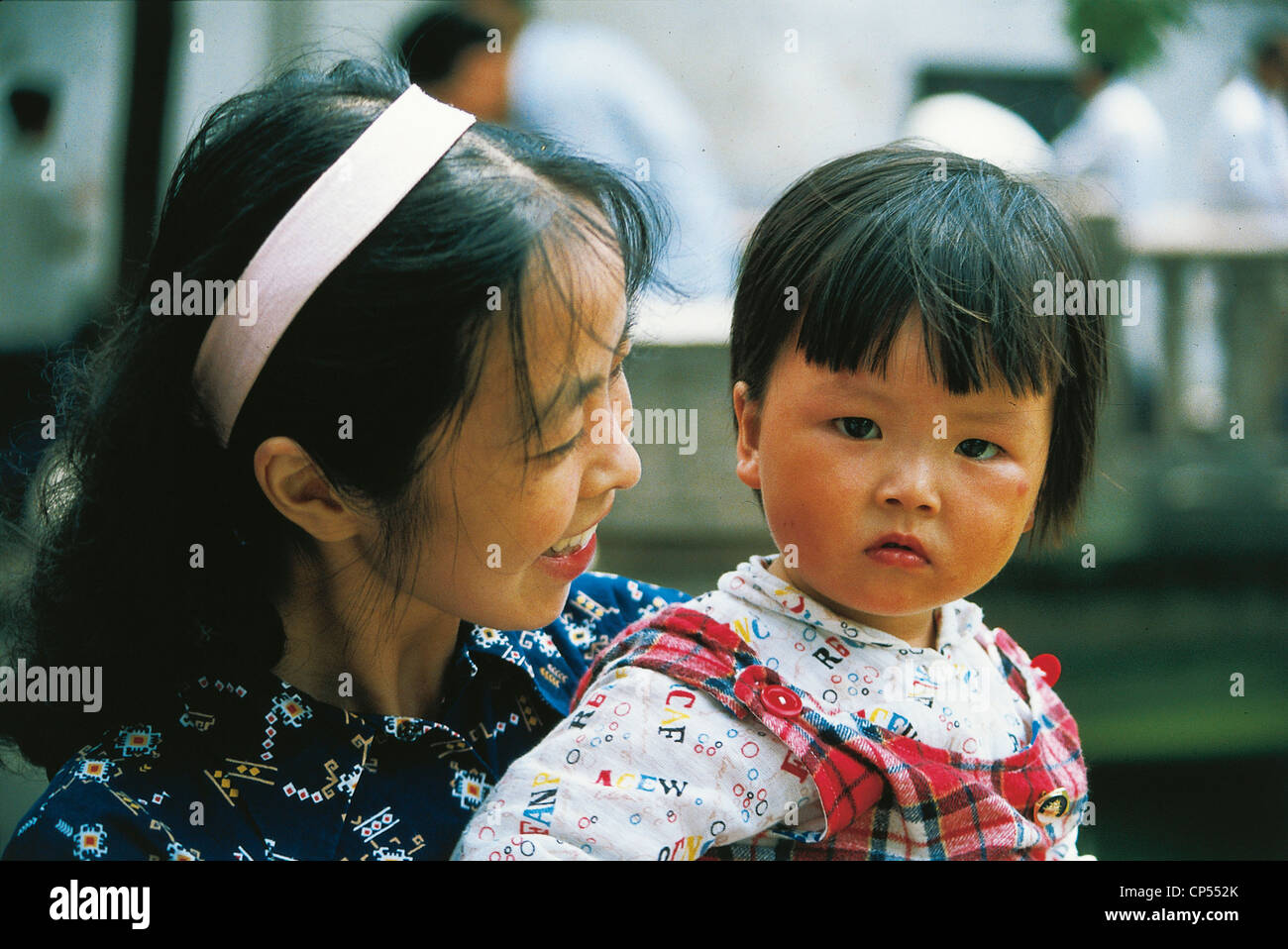 Shanghai China Human Kind Mother With Baby Stock Photo - Alamy