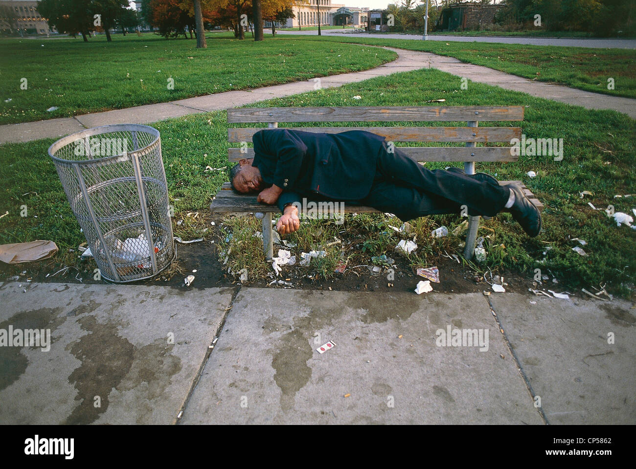 USA - Michigan - Detroit. Homeless sleeping on a bench Stock Photo - Alamy