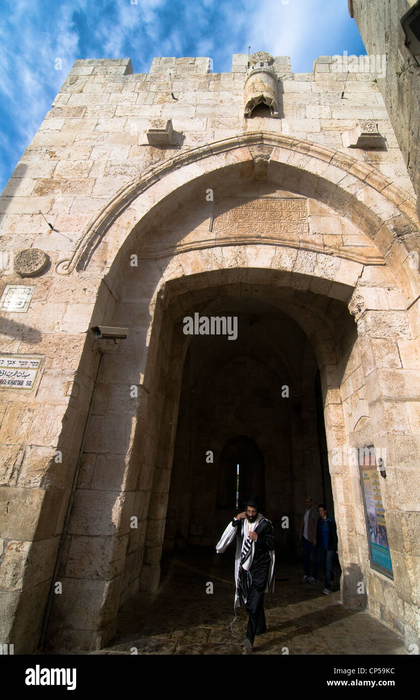An Orthodox Jewish man walking into the old city through Jaffa gate ...