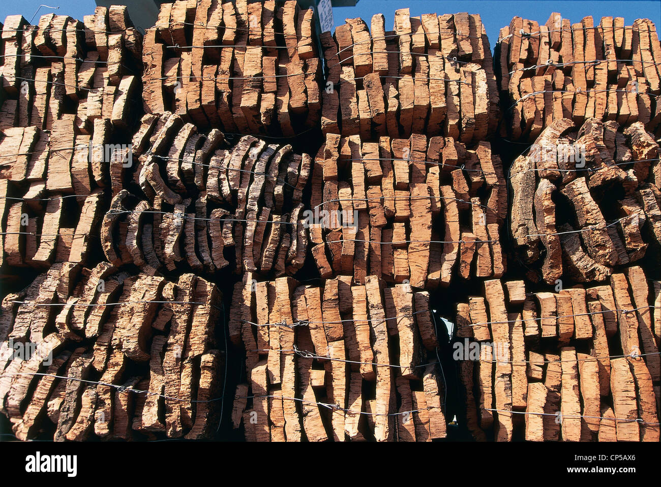 Sardinia - the cork industry: piles of cork boards Stock Photo - Alamy