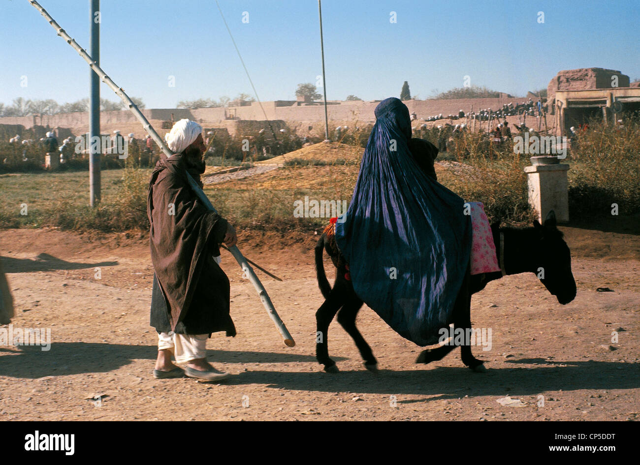 Afghanistan - Herat. Man and woman with the full burqa or Afghan burqa ...