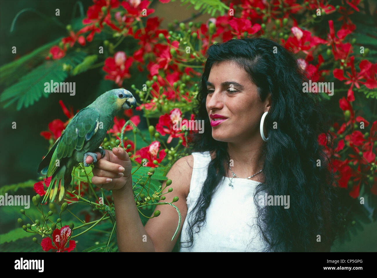 Woman and parrot hi-res stock photography and images - Alamy