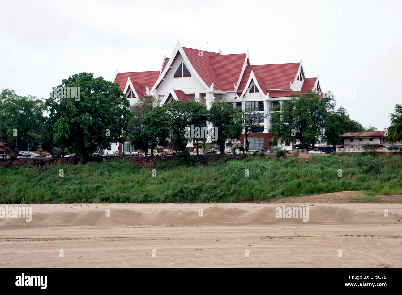 A large government building serves the communist city of Vientiane ...