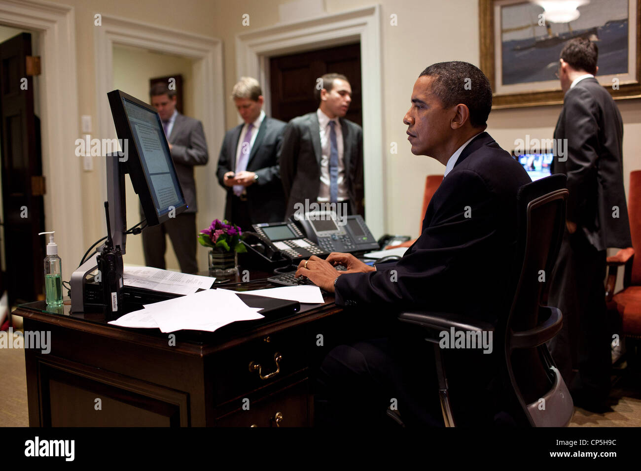 President Barack Obama works on his statement on the compromise reached ...