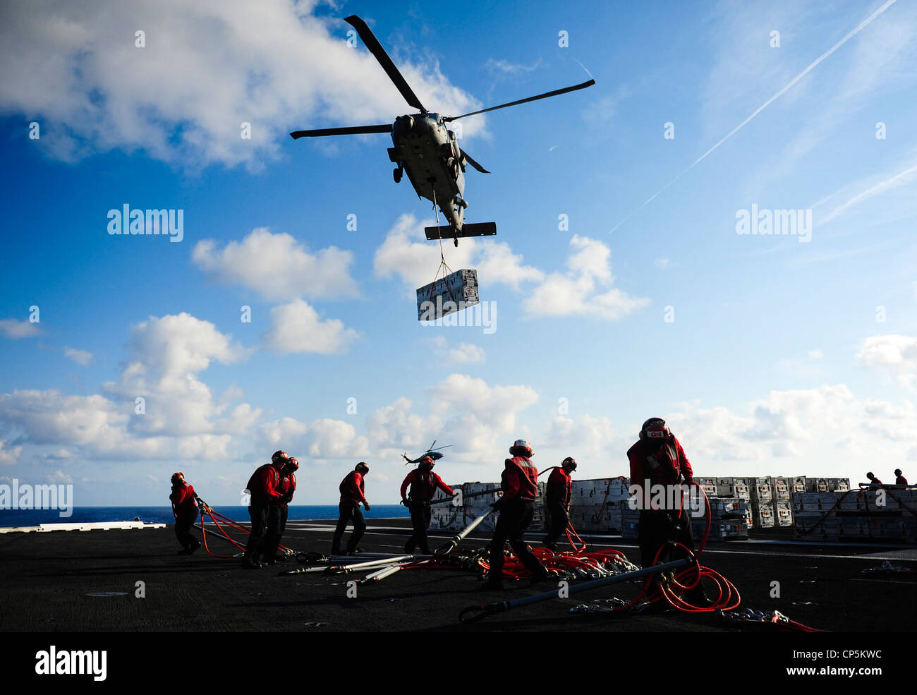 Sailors pre-stage the flight deck of the aircraft carrier USS George H ...