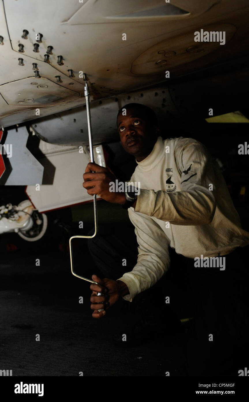 Aviation MachinistÕs Mate 3rd Class Franck Happi-Happi, assigned to ...