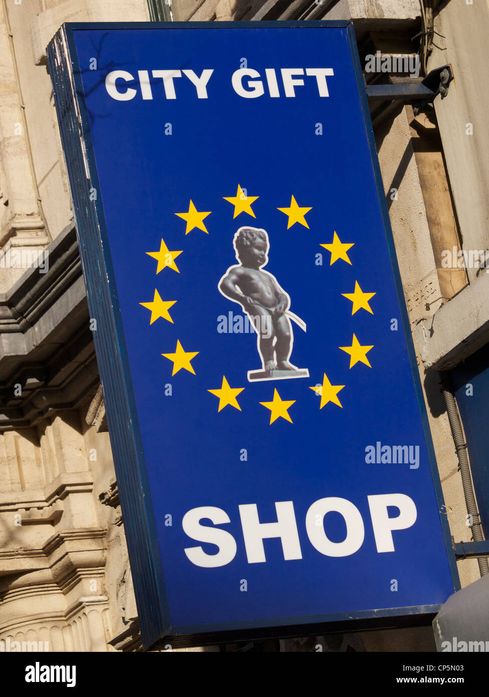 Gift shop sign in Brussels with the European flag and Manneken Pis on ...