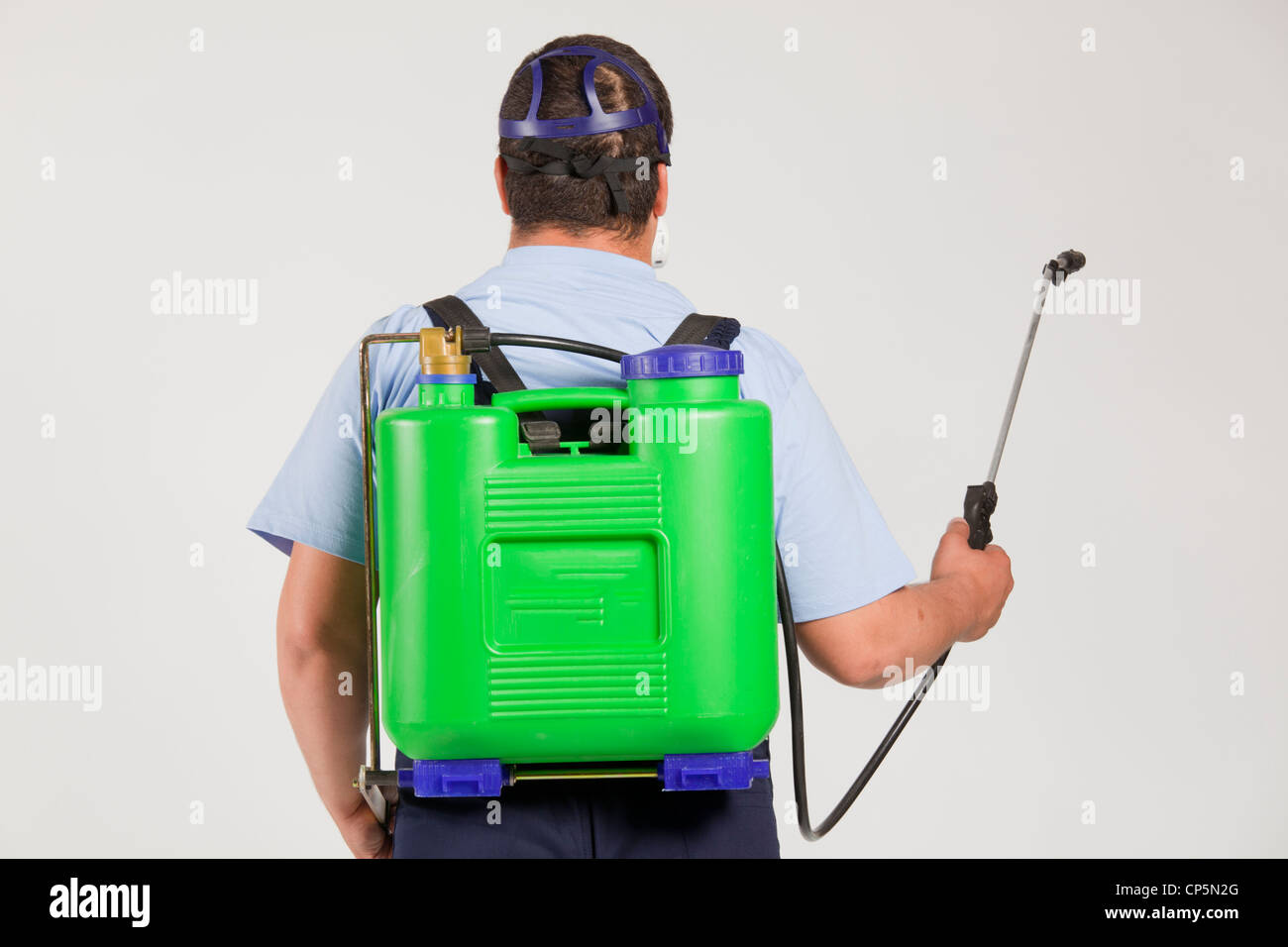 Man spraying insect aerosol hi-res stock photography and images - Alamy