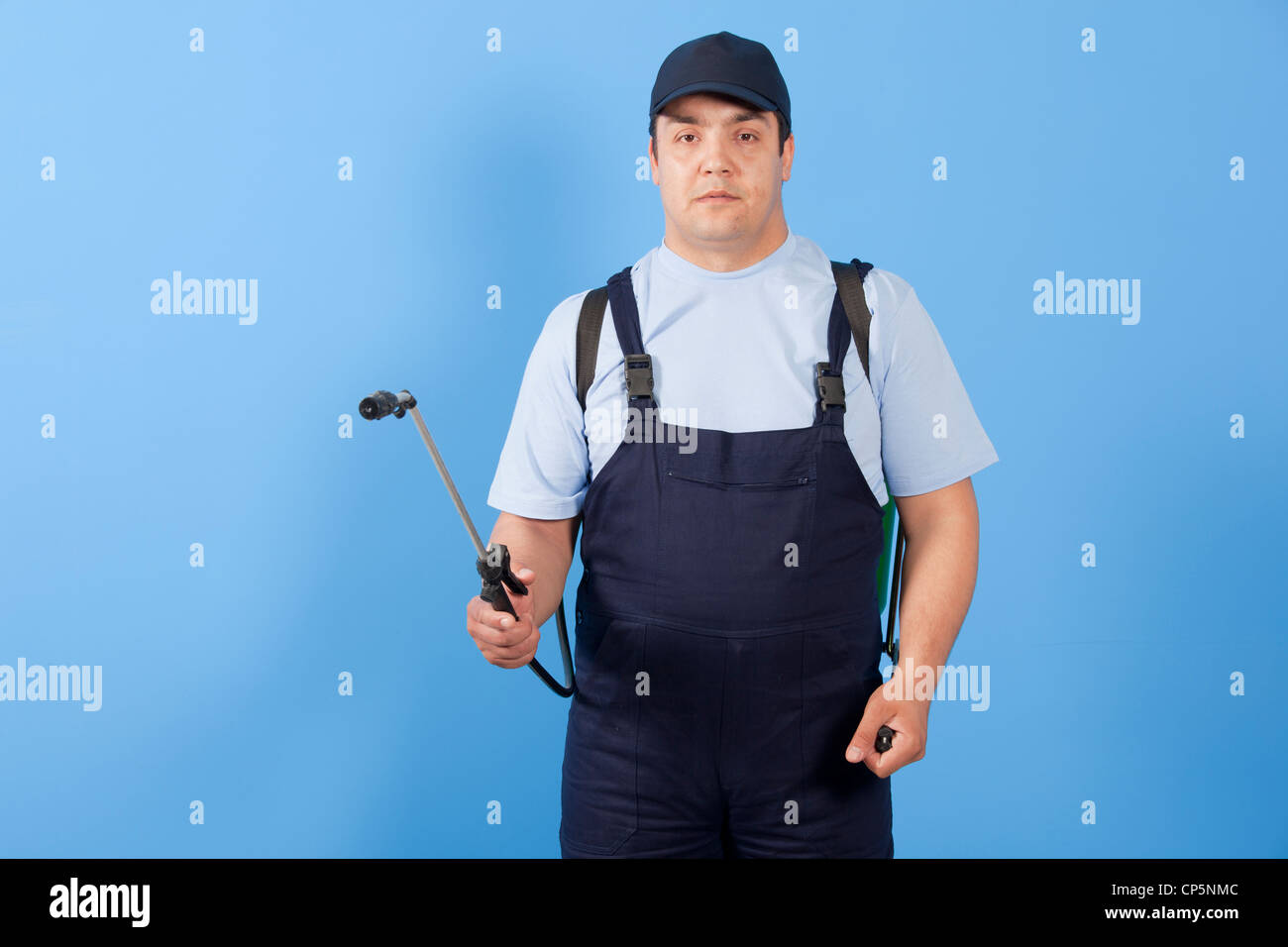 Man spraying insects- pest control Stock Photo - Alamy