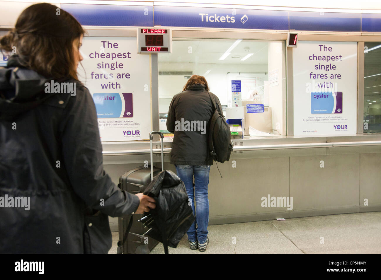 Queueing for tickets on the London Underground, London, UK Stock Photo ...