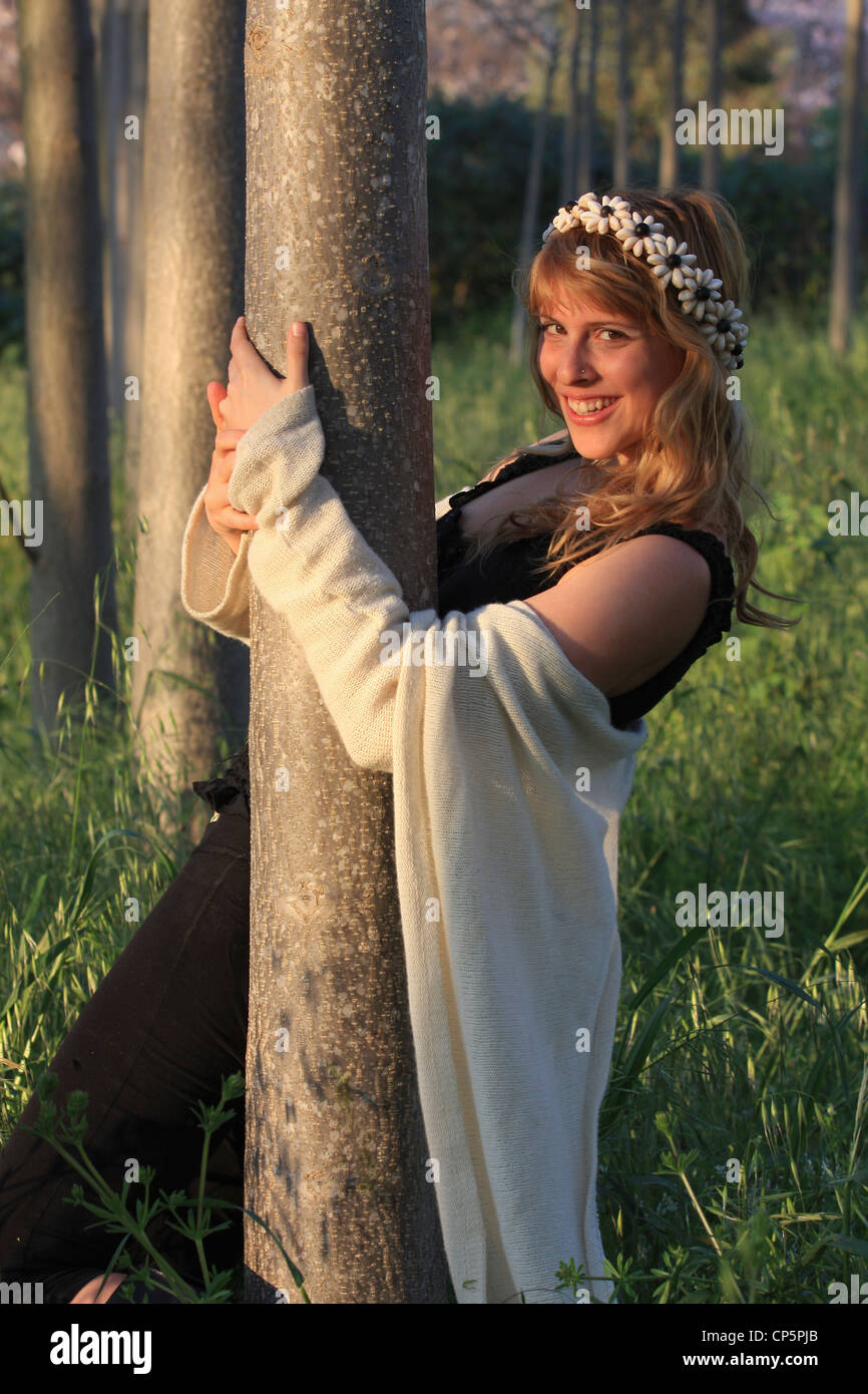 Lady hugging a tree hi-res stock photography and images - Alamy