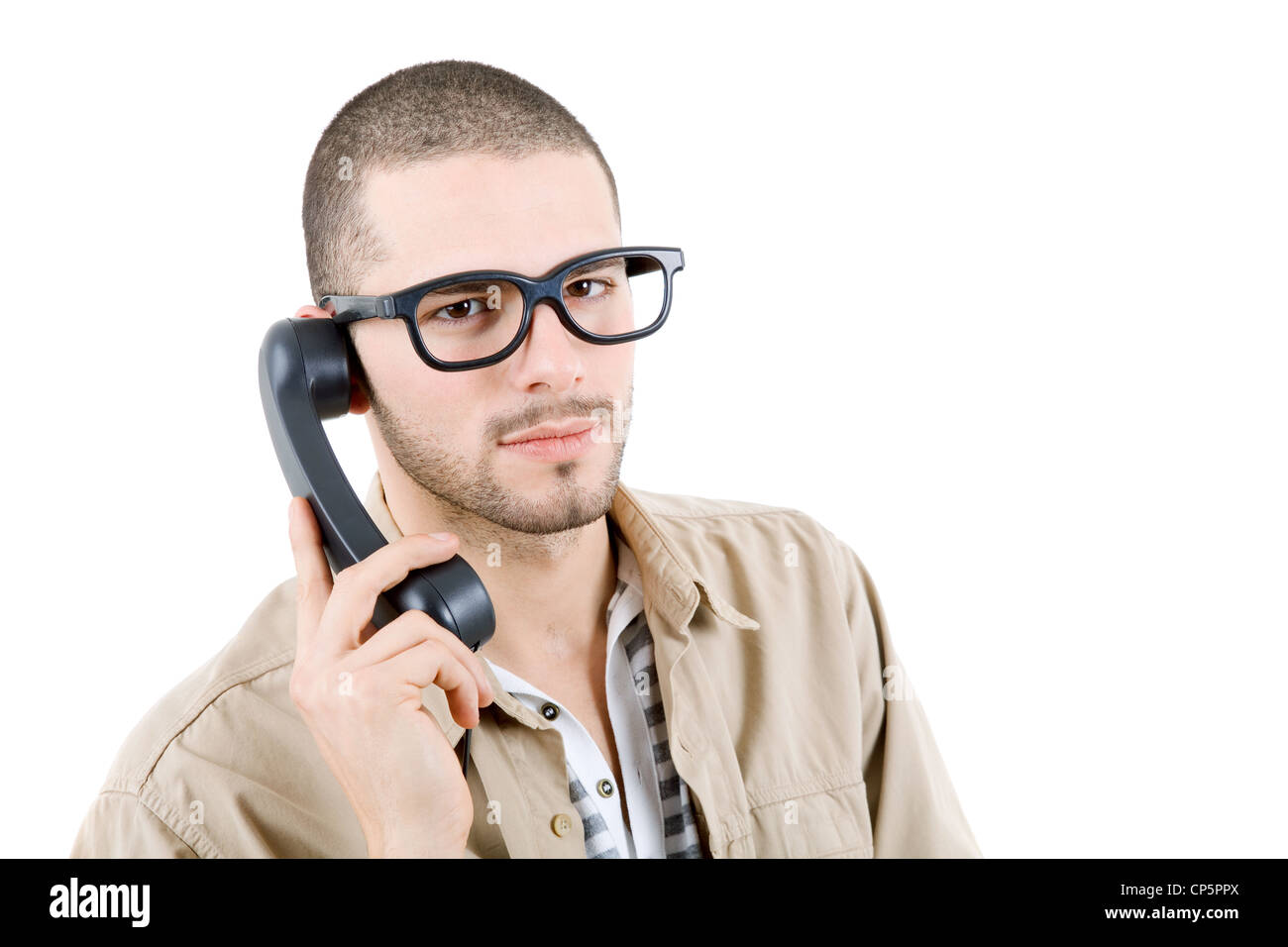 young man with a phone, isolated on white Stock Photo - Alamy