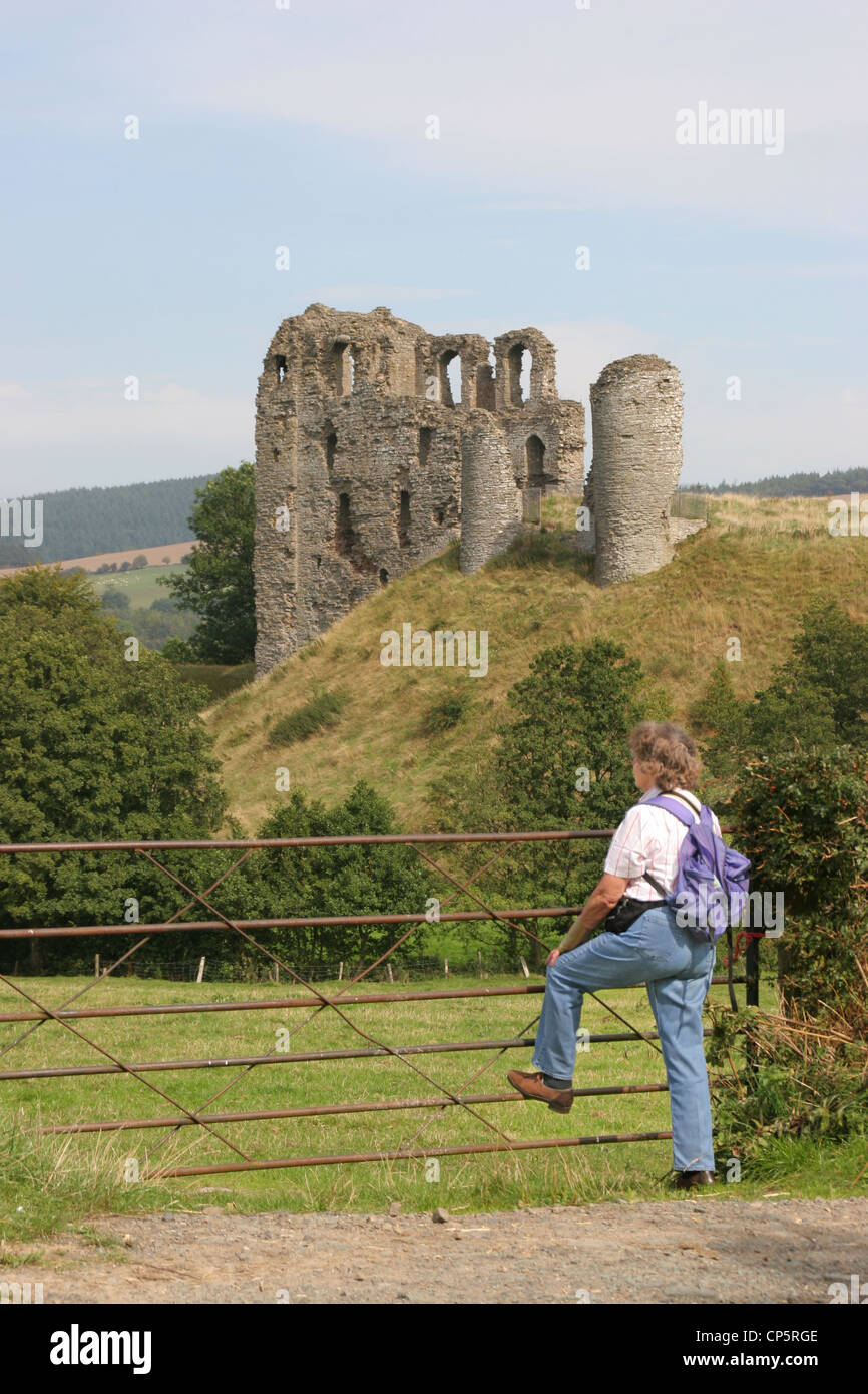 Clun Castle and walker at gate Clun Shropshire England UK Stock Photo ...