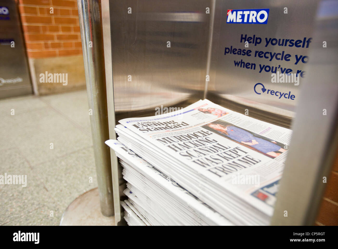 Newspaper dispenser in St Pancras Station, London, UK Stock Photo - Alamy