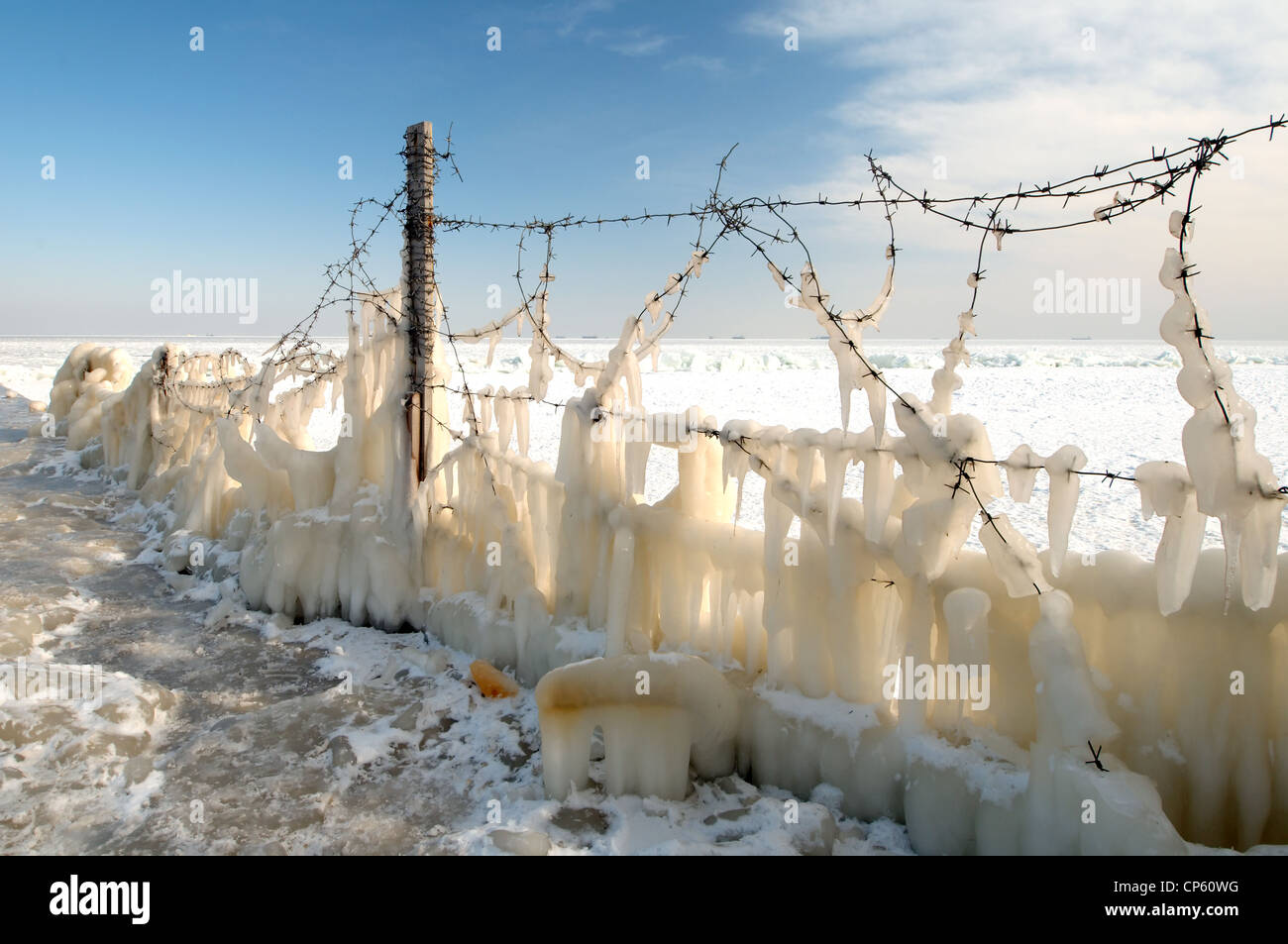 Icy barbed wire, frozen Black Sea, a rare phenomenon, Odessa, Ukraine ...