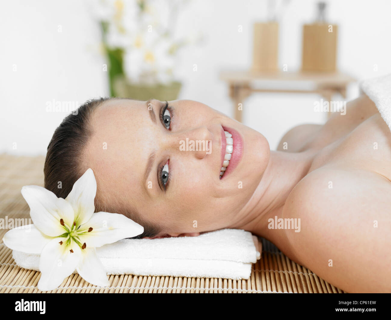 Young woman at spa, smiling, portrait Stock Photo - Alamy