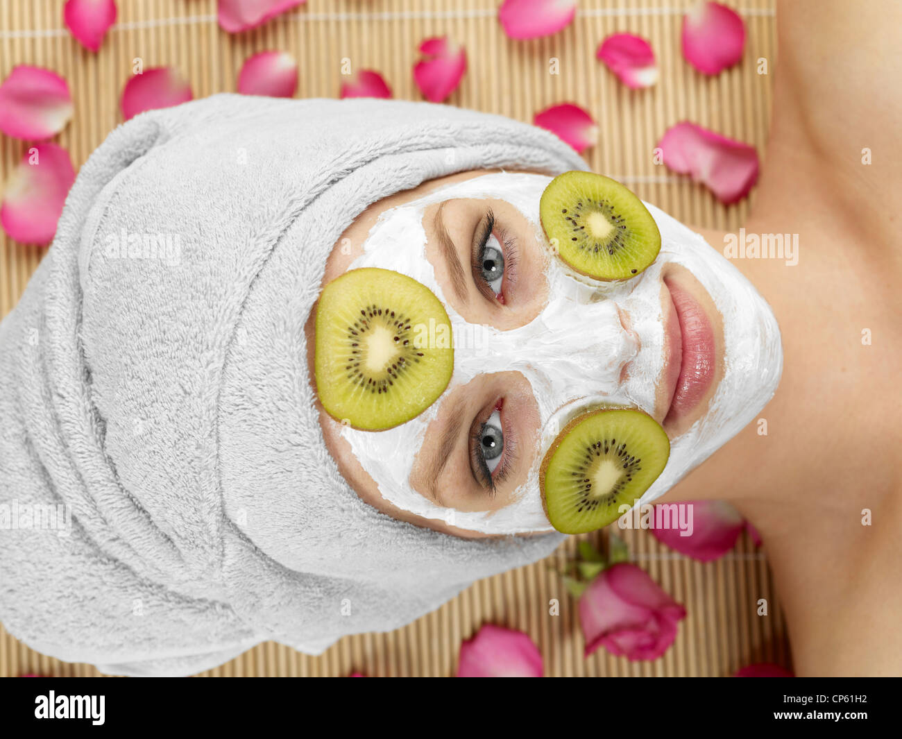 Young woman with face mask at spa, portrait Stock Photo - Alamy