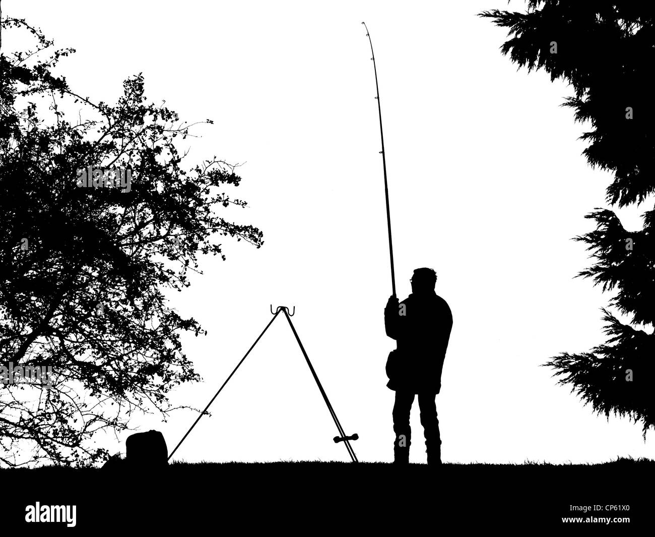 A silhouette of an angler Stock Photo - Alamy