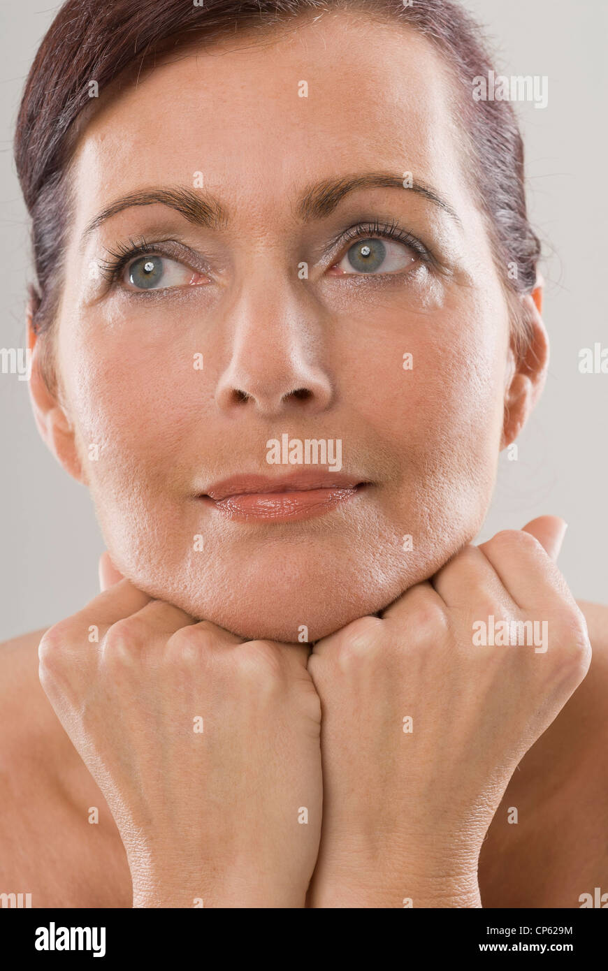 Mature woman smiling, close up Stock Photo - Alamy