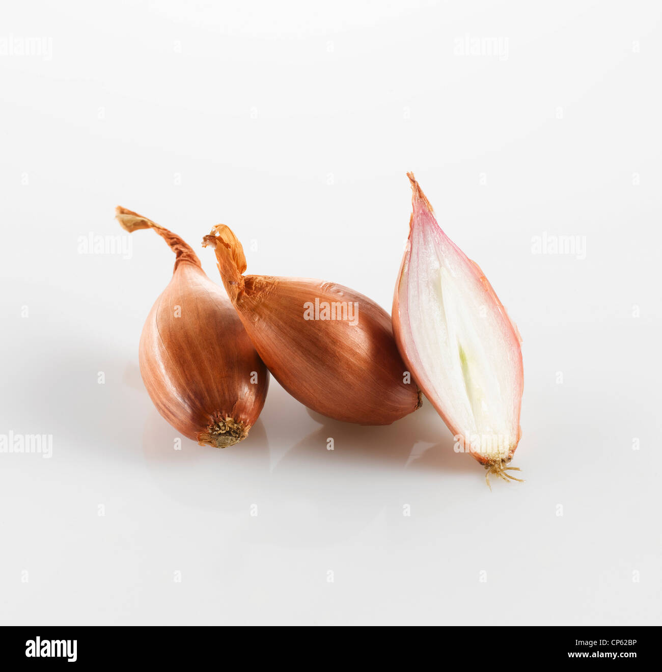 Shallot on white background Stock Photo - Alamy