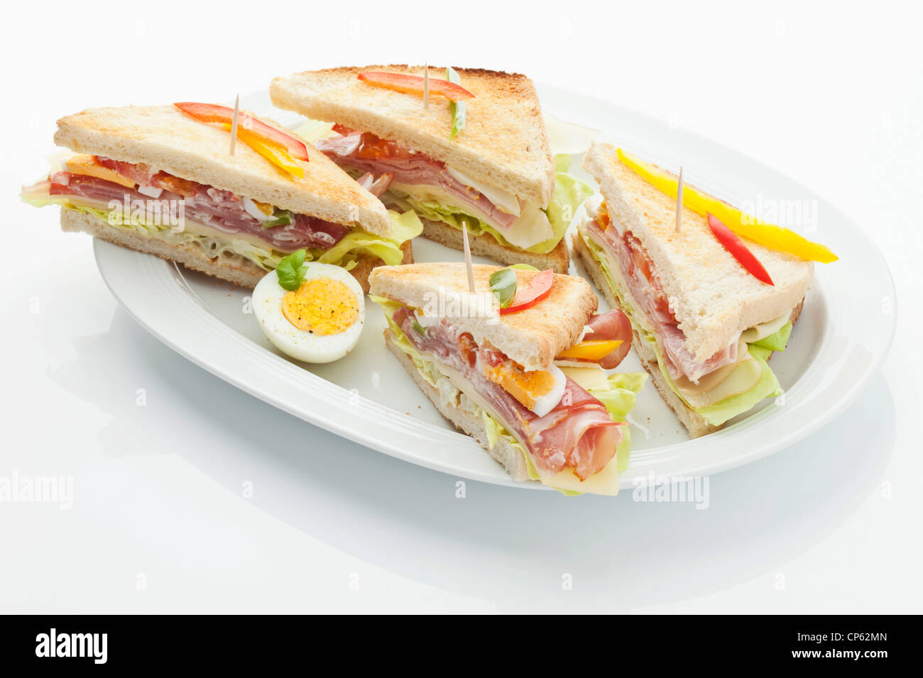 Sandwich in plate on white background Stock Photo - Alamy
