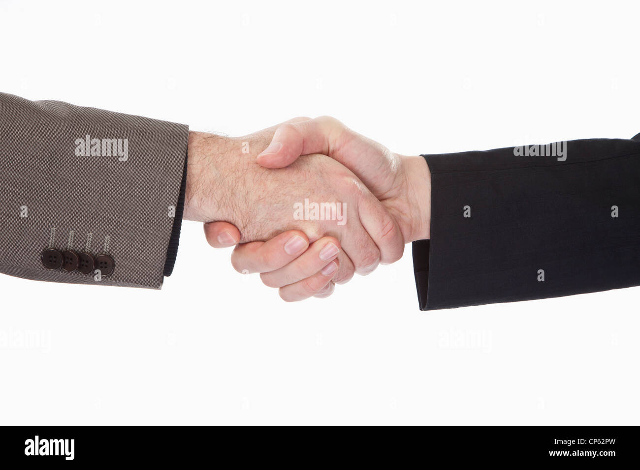 Businessman shaking hands, close up Stock Photo - Alamy
