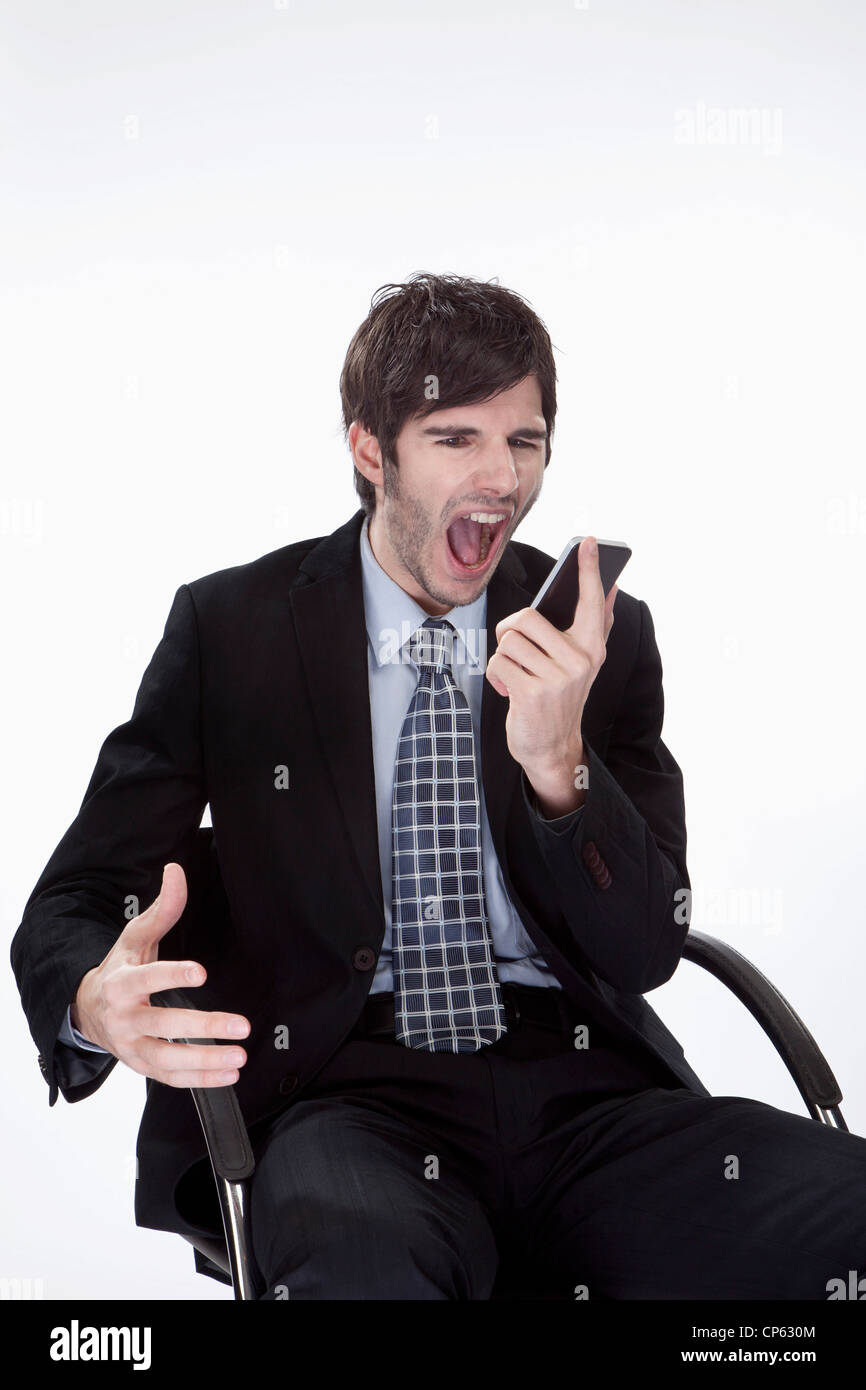 Man sitting in chair screaming hi-res stock photography and images - Alamy
