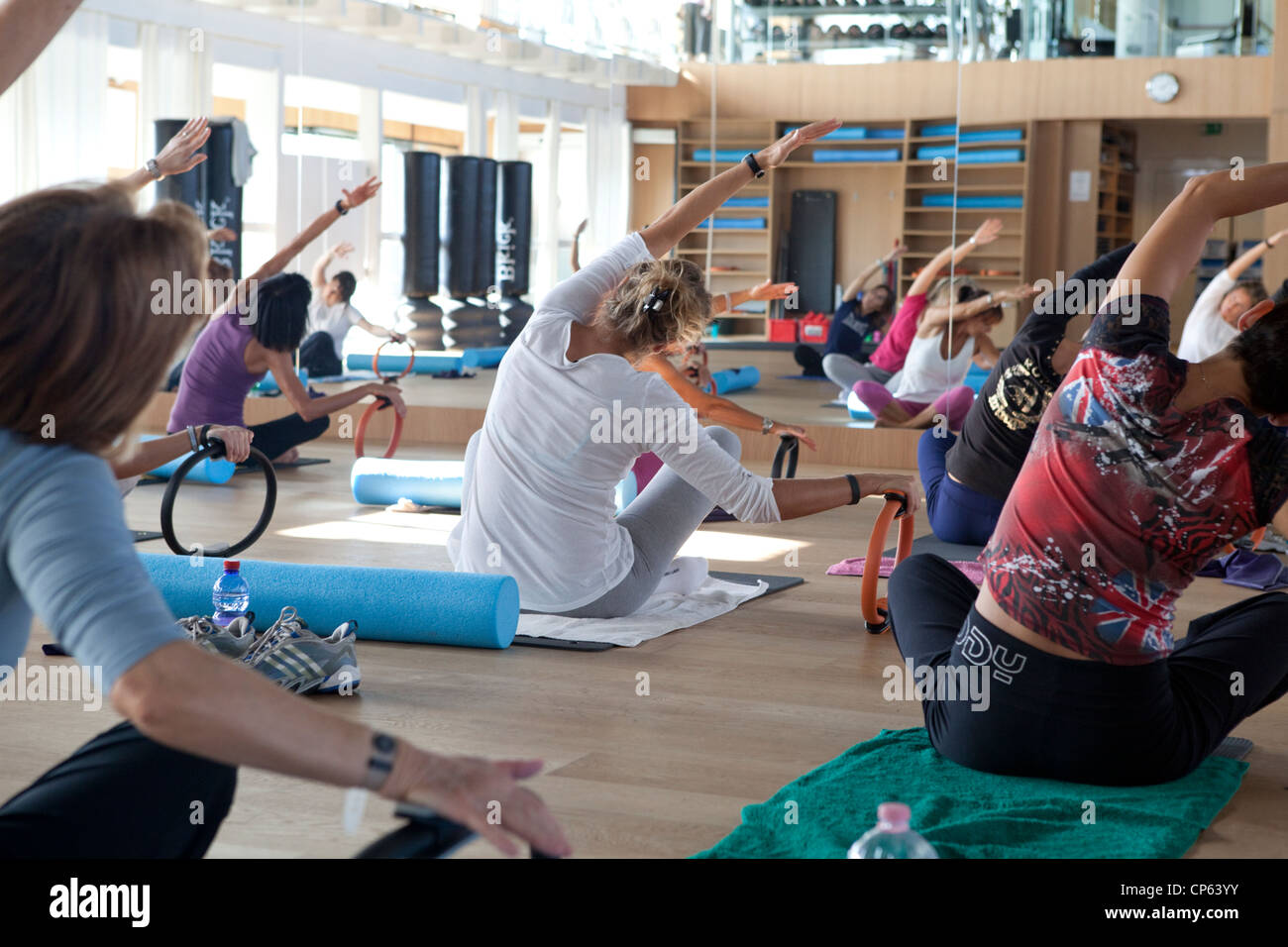 Relaxing and stretching class at the gym Stock Photo - Alamy
