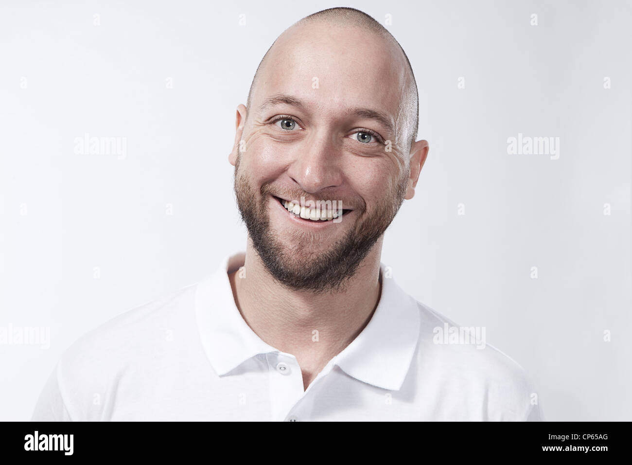 Mid adult man smiling, portrait Stock Photo - Alamy