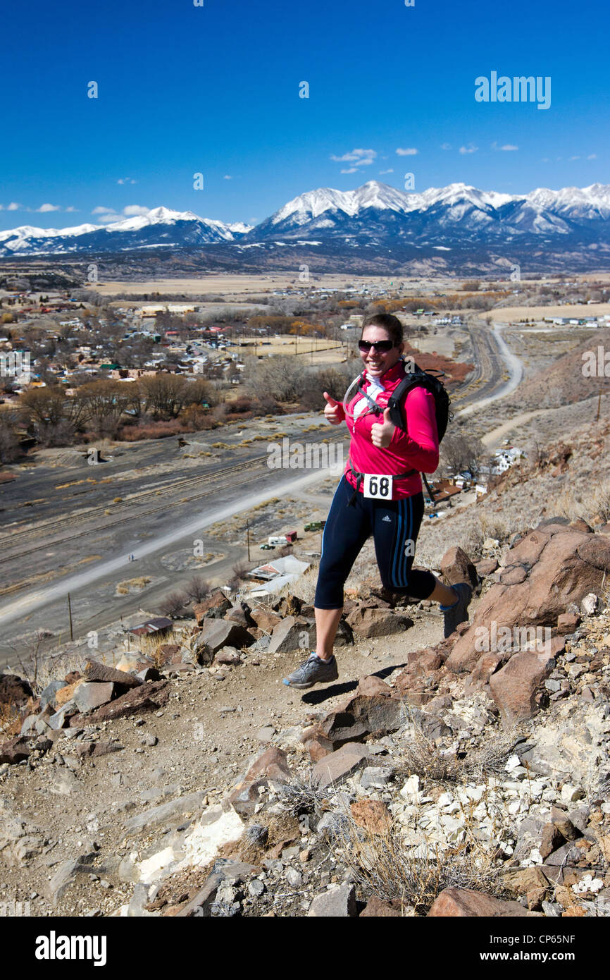 Female runner competes in the Run Through Time Half Marathon, Salida ...