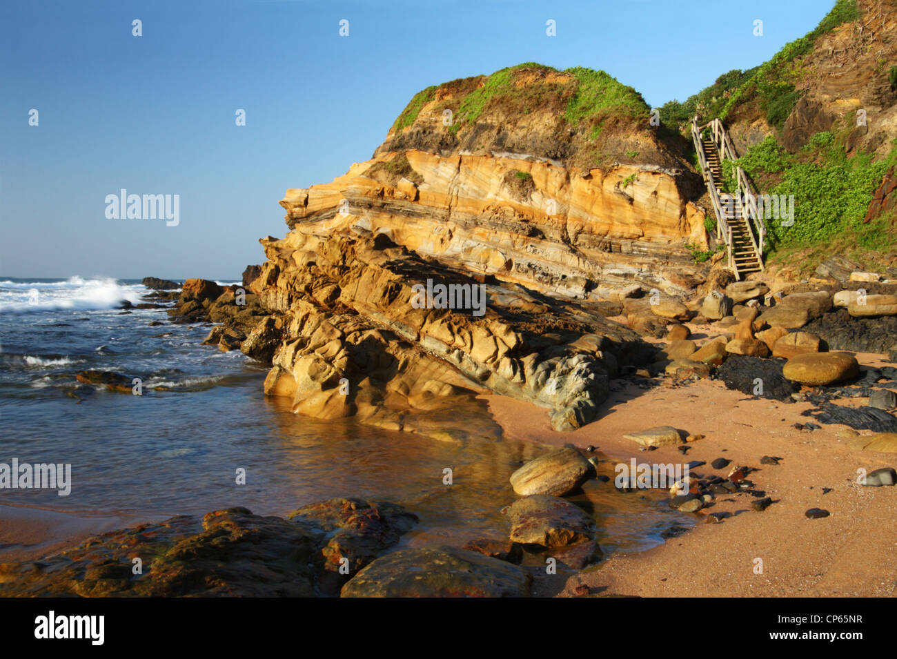 A sandstone cliff at Thompson's Bay, Ballito, Kwazulu Natal, South ...
