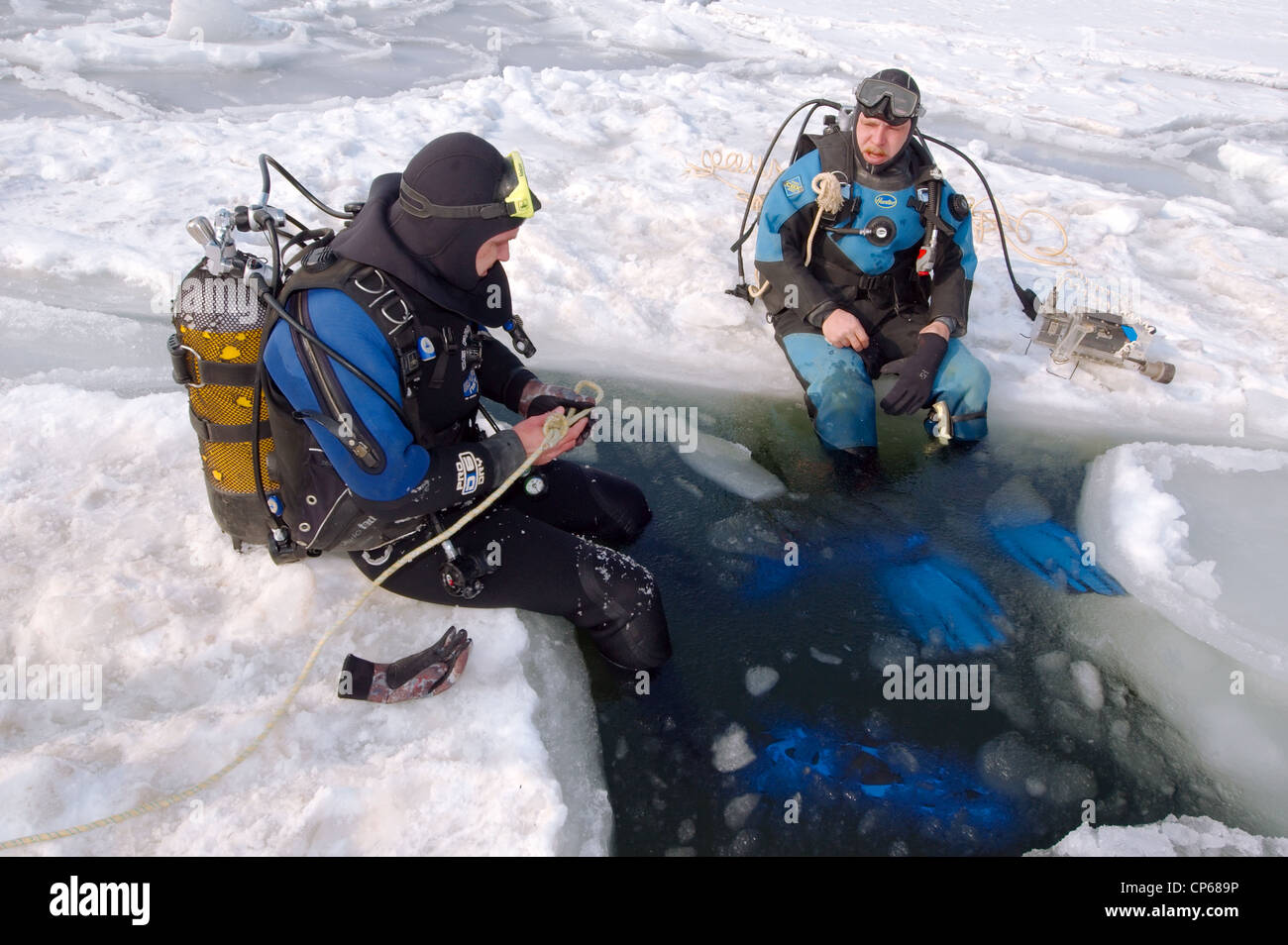 Divers, subglacial diving, ice diving, in the frozen Black Sea, a rare ...