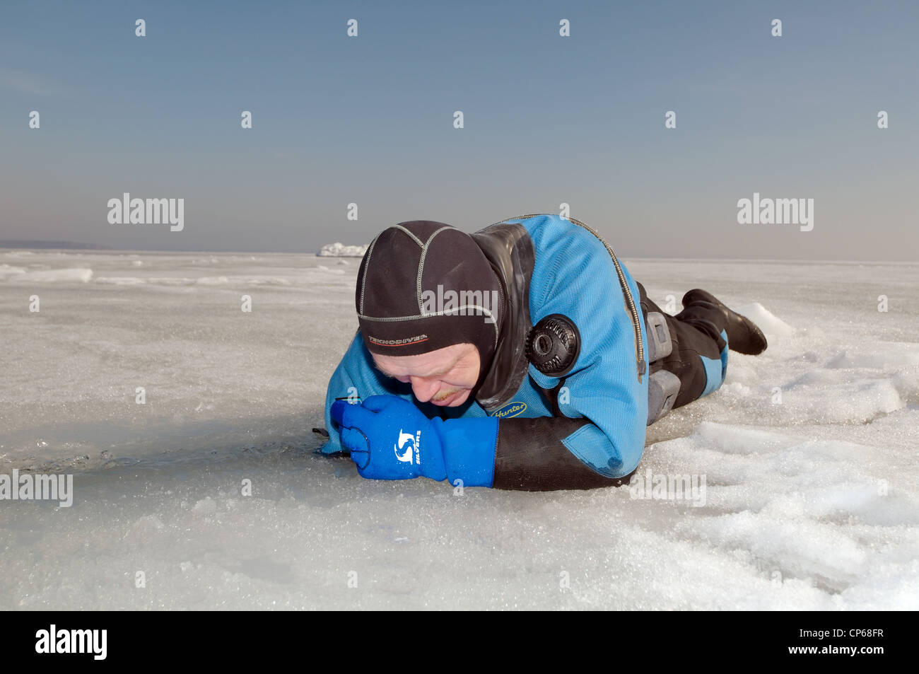 Diver, subglacial diving, ice diving, in the frozen Black Sea, a rare ...