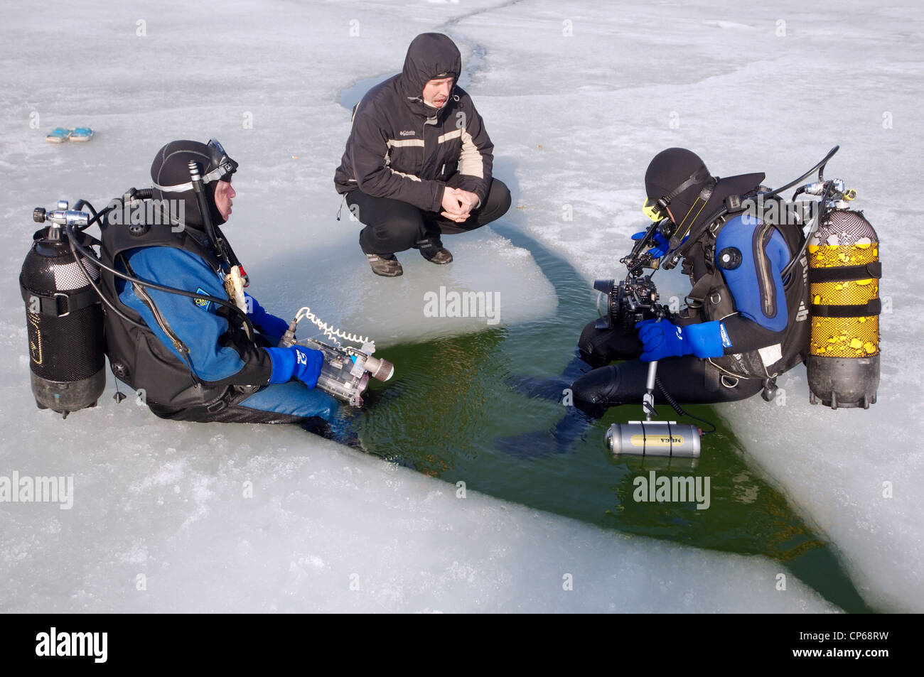 Divers, subglacial diving, ice diving, in the frozen Black Sea, a rare ...