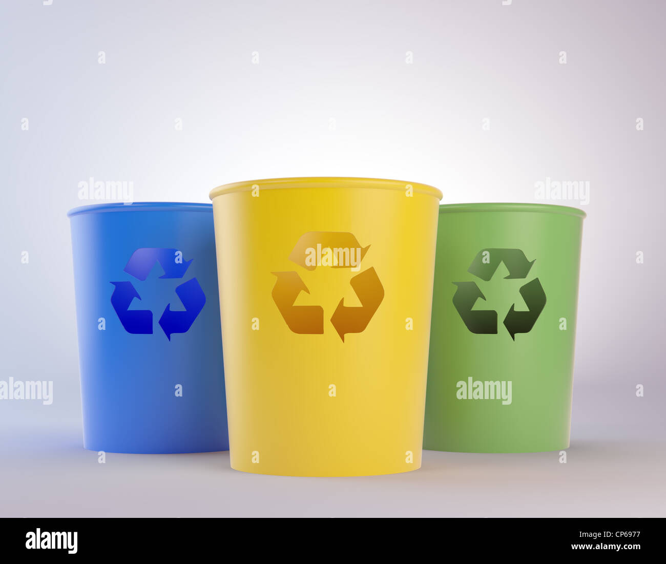 Three colorful trash bins with recycling symbols Stock Photo - Alamy