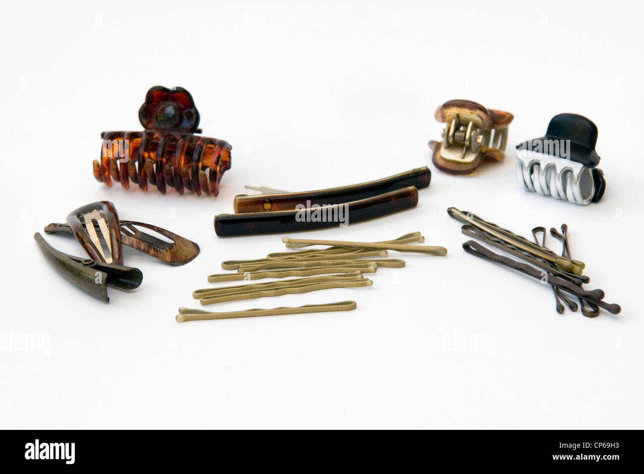 Selection of hair grips and clips against a white background Stock ...