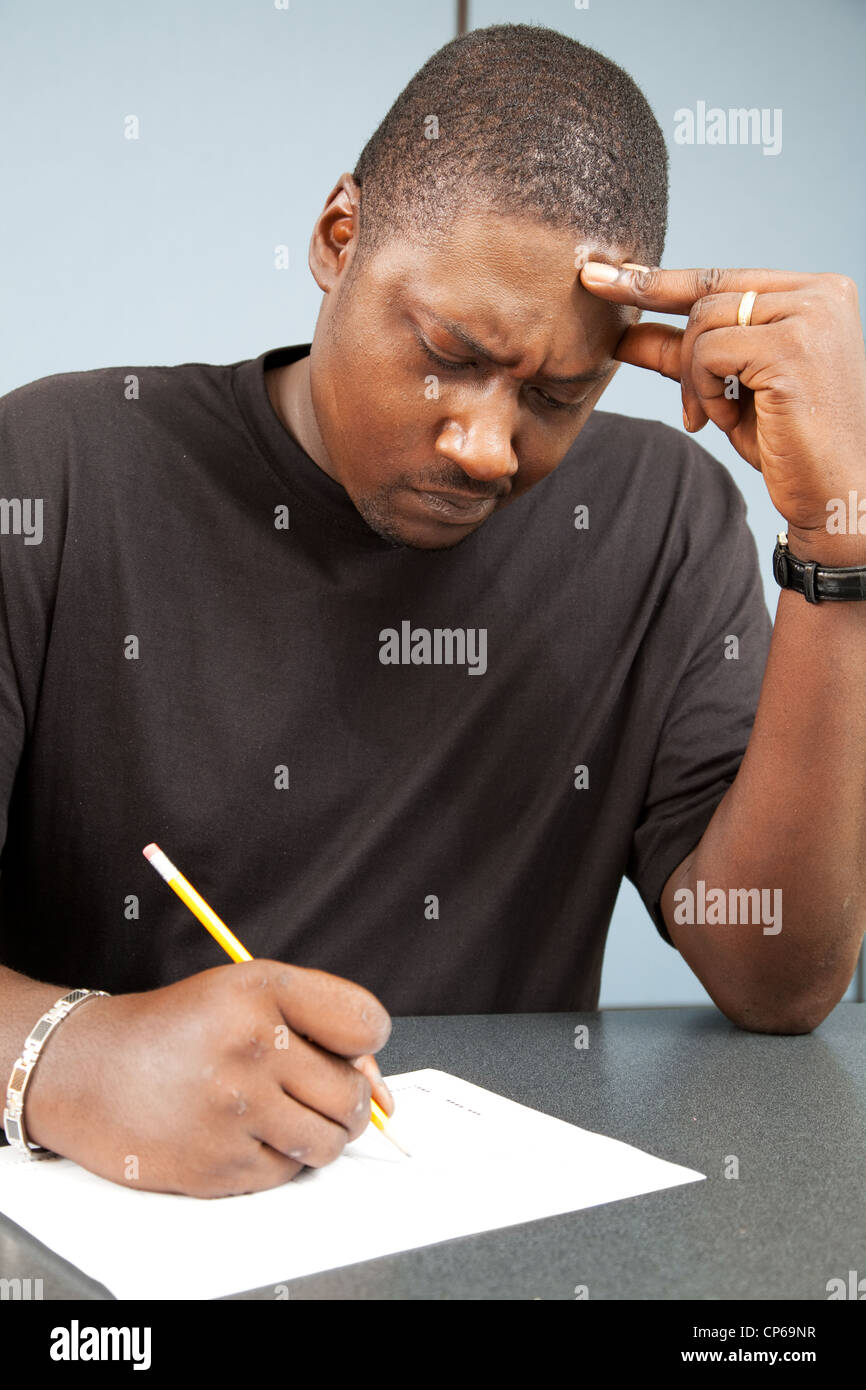 Black man takes test hi-res stock photography and images - Alamy