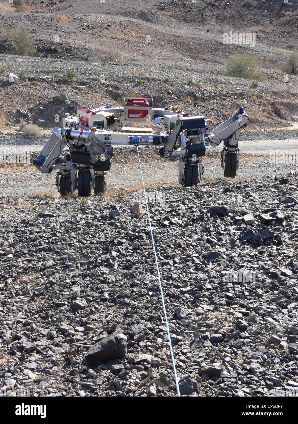 The ATHLETE rover rappelling down a steep slope Stock Photo - Alamy